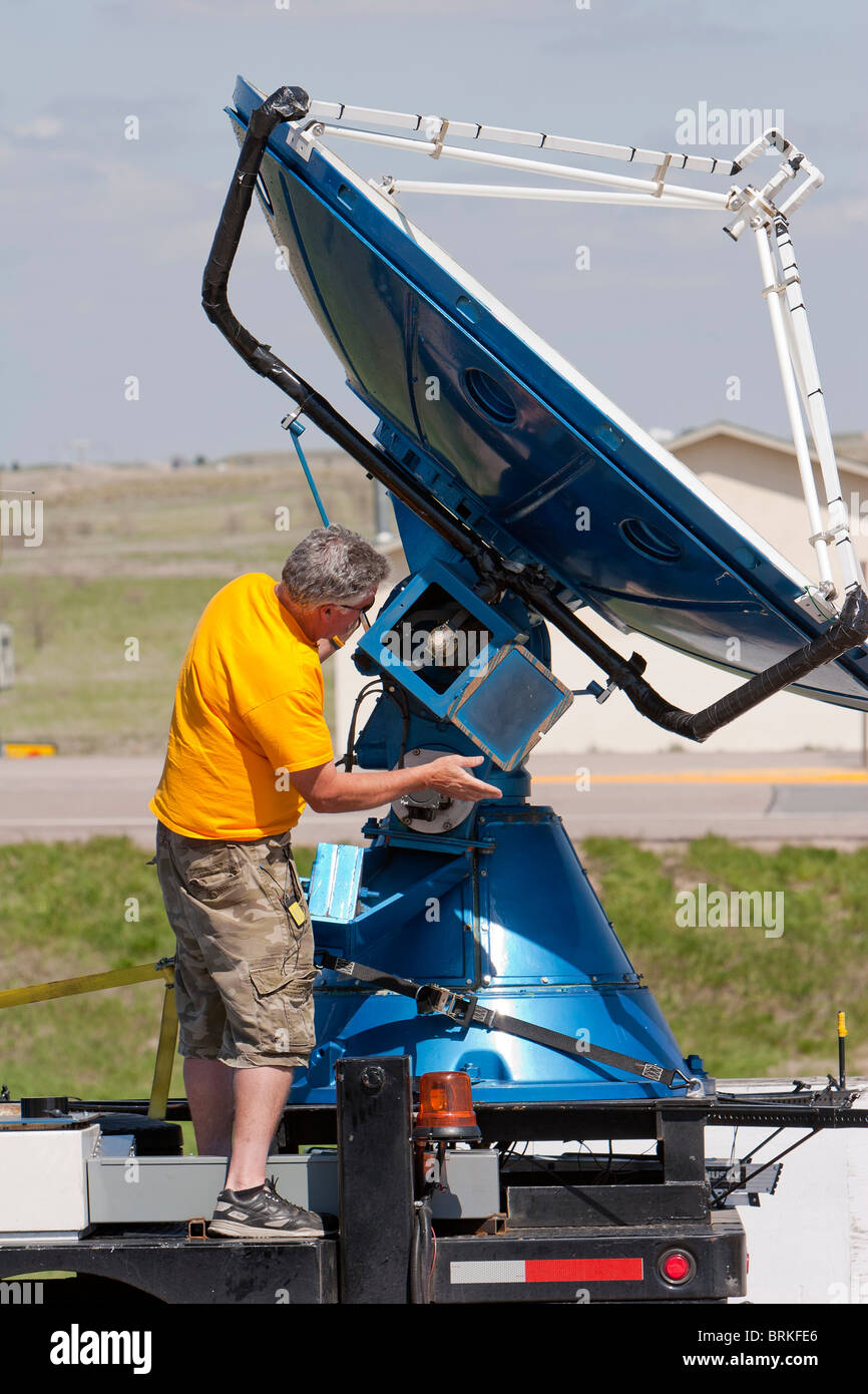 Storm chaser and Project Vortex 2 member Herb Stein repairs the Doppler ...