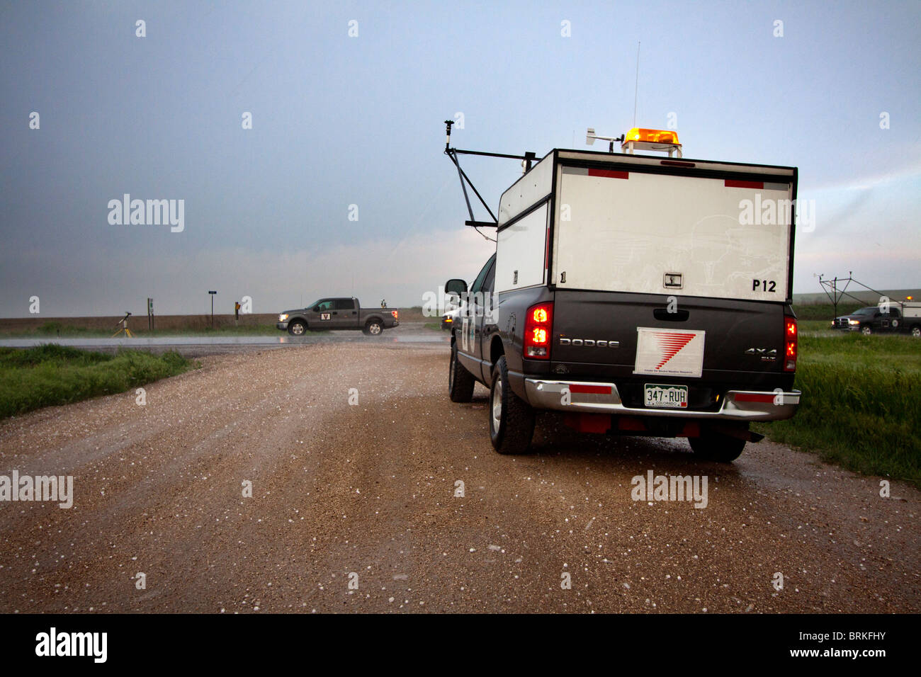 Project Vortex 2 storm chasers parked alongside the road in Kansas with ...