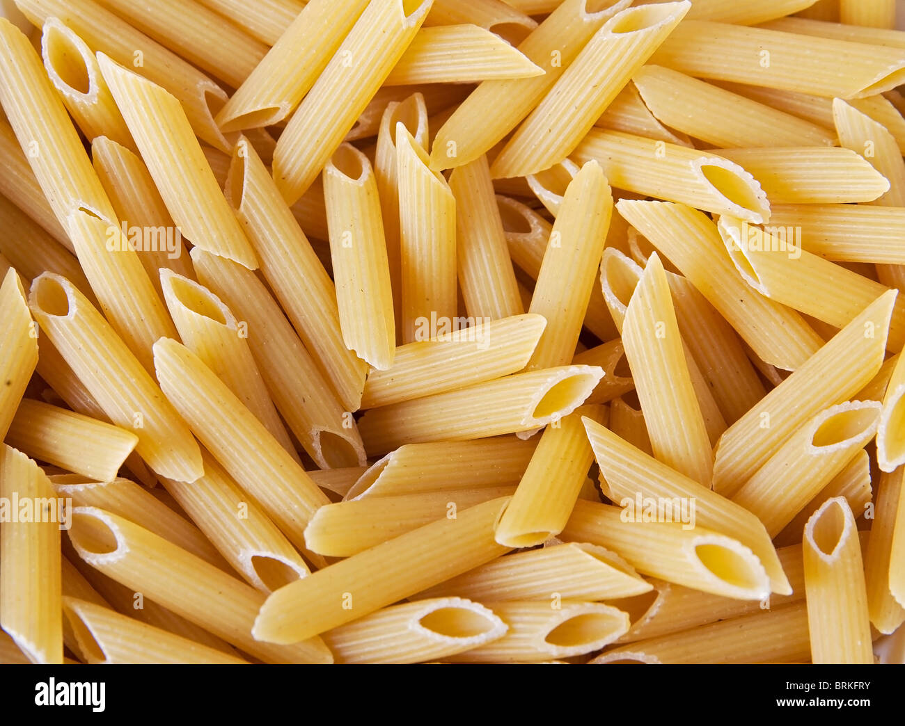Pile of uncooked pasta hi-res stock photography and images - Alamy