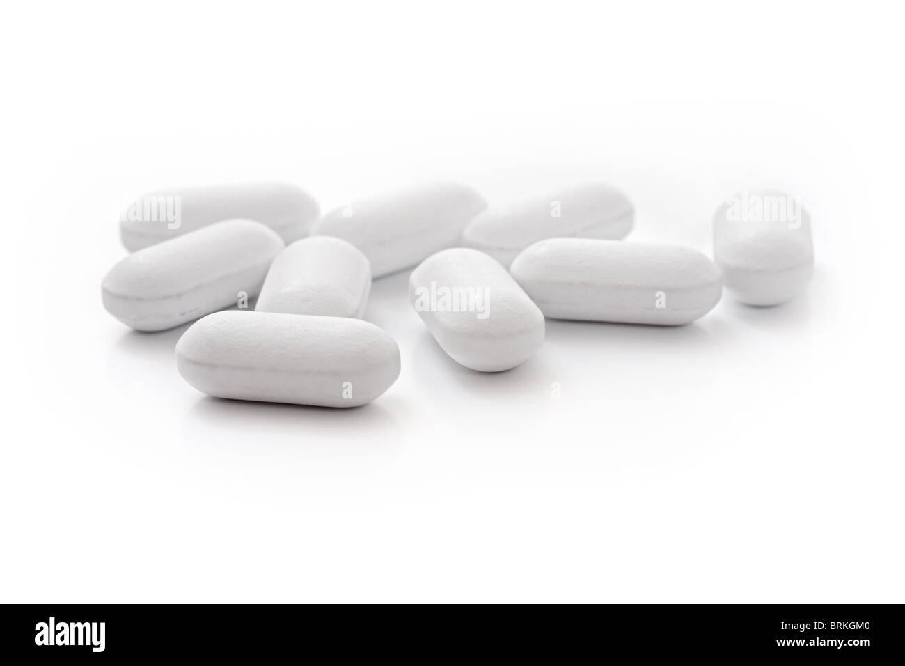 white medical tablets over white Stock Photo - Alamy