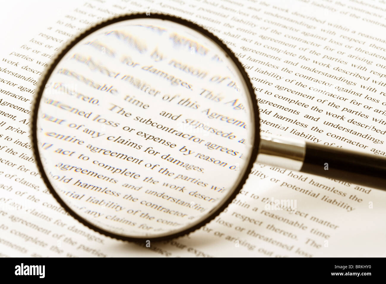 Magnifying Glass and document close up Stock Photo - Alamy
