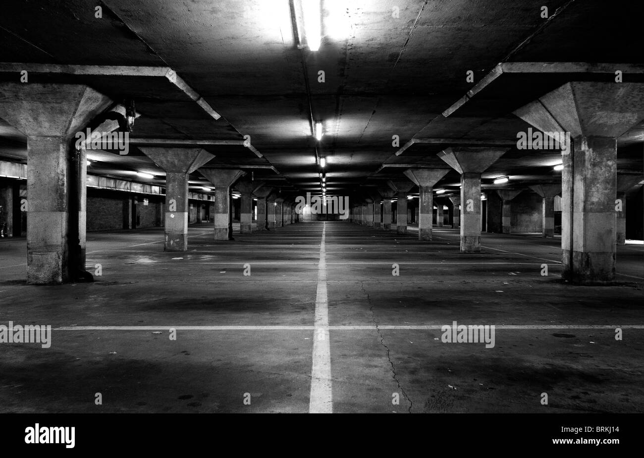 Dark concrete car park Stock Photo - Alamy