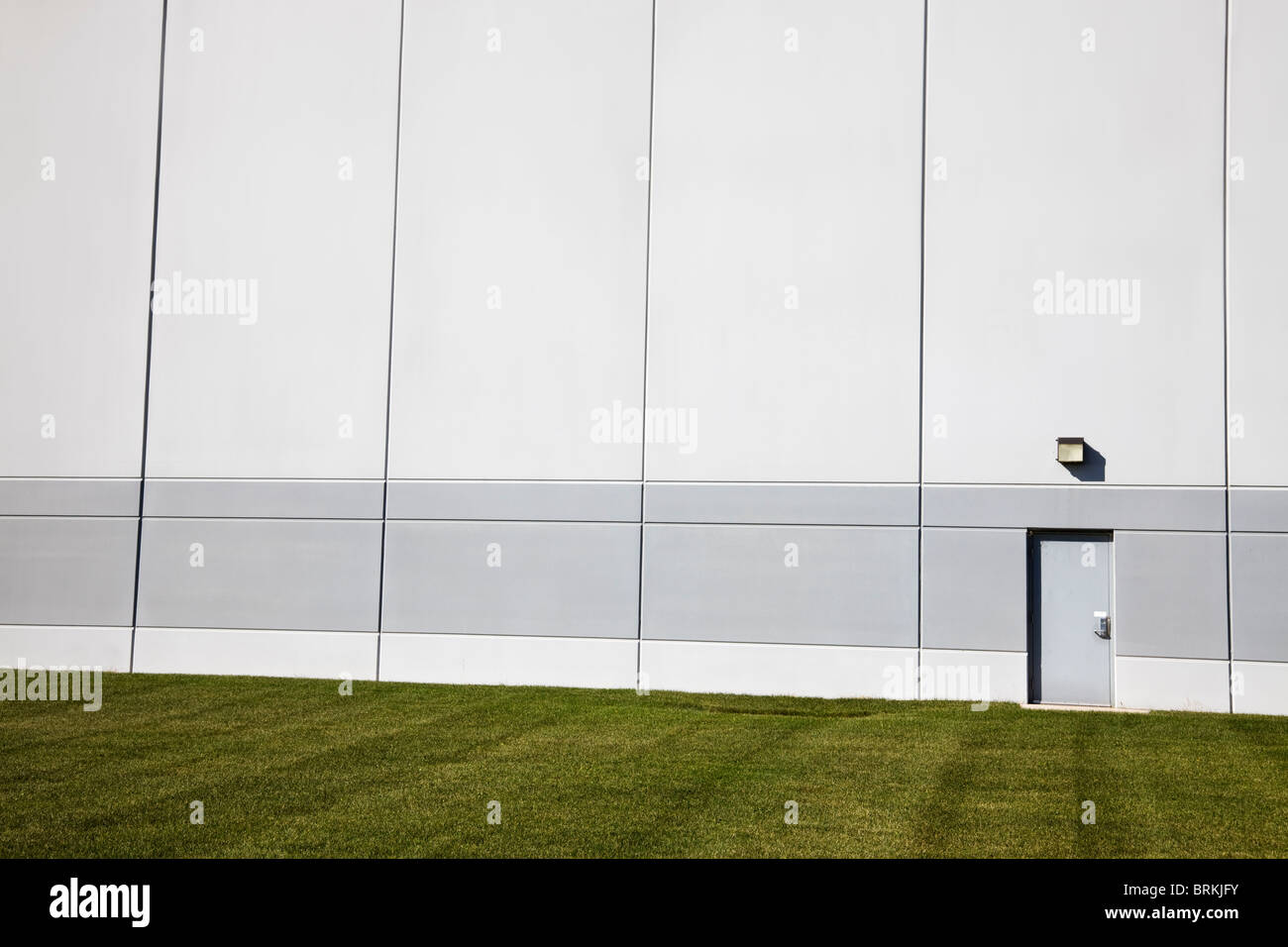 Lonely door - back of the warehouse Stock Photo - Alamy