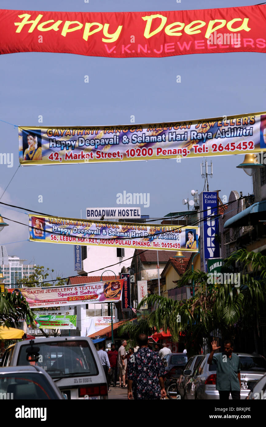 Banners expressing Happy Deepavali (Deepa) hang above a street in the ...