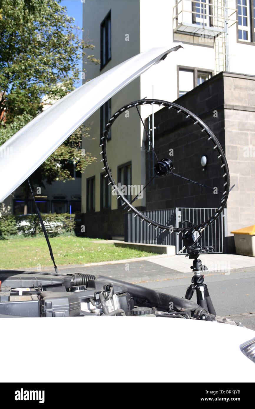 A microphone array of an acoustic camera set up to measure the engine ...