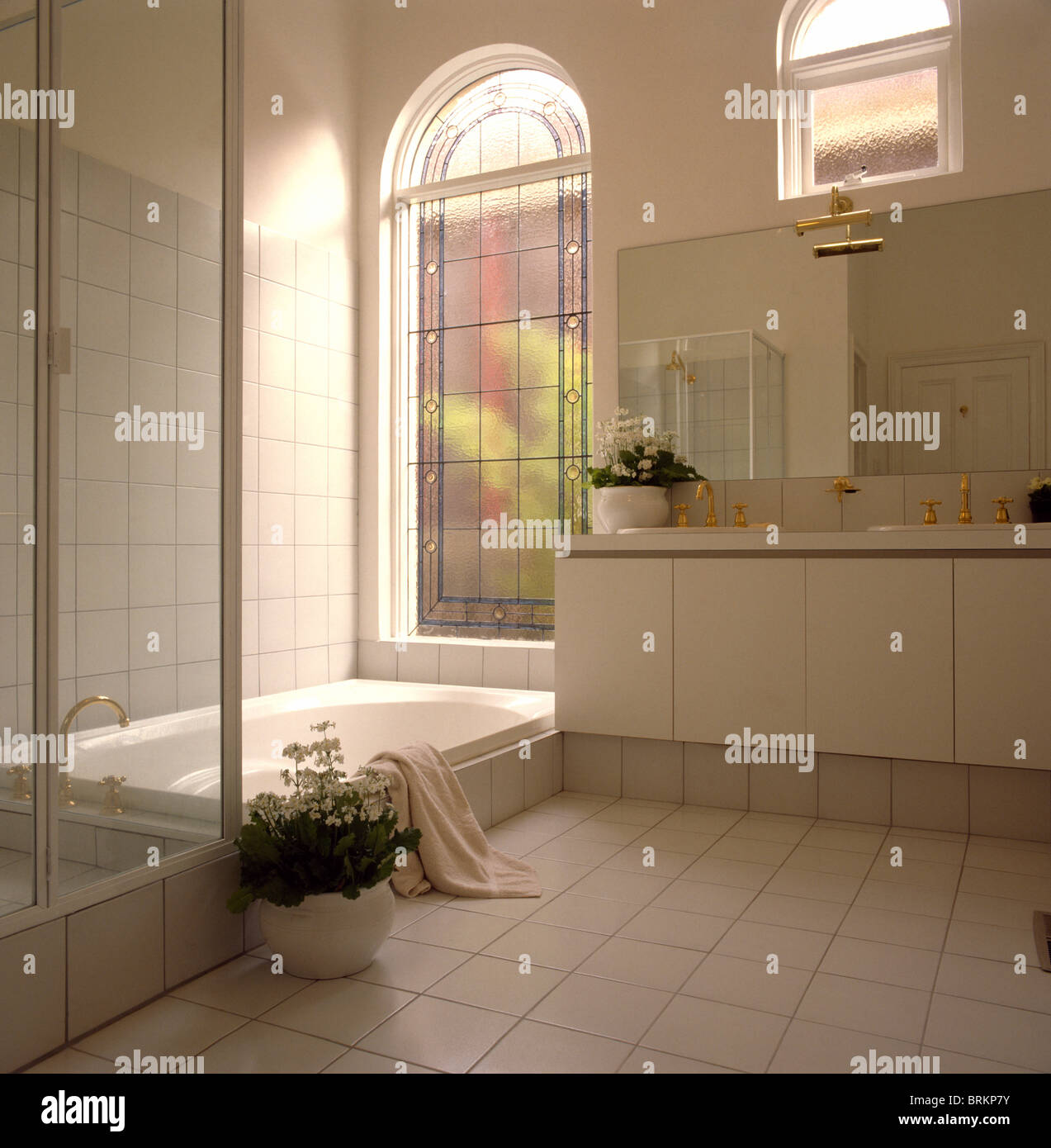 Stained glass window above bathroom hi-res stock photography and images ...