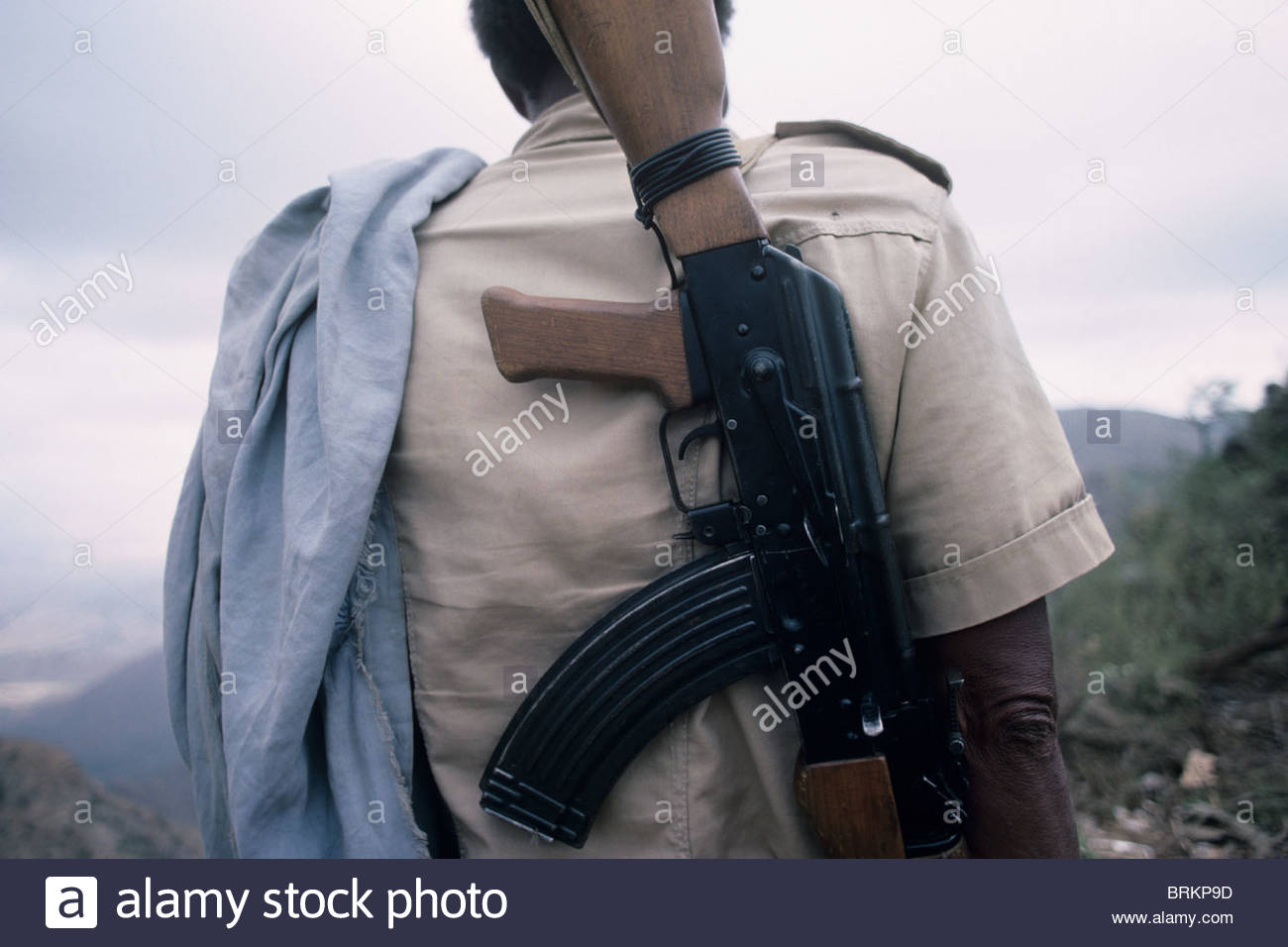 An Eritrean soldier carries an Ak47 rifle on patrol Stock Photo - Alamy