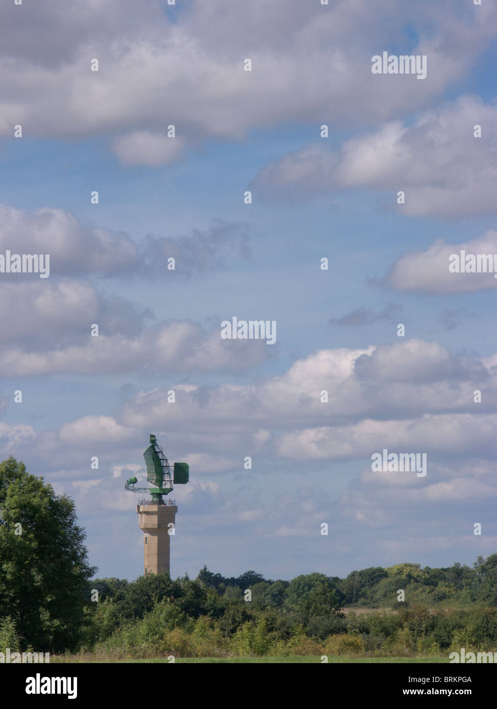 radar tower in a landscape tree all around with blue sky Stock Photo ...