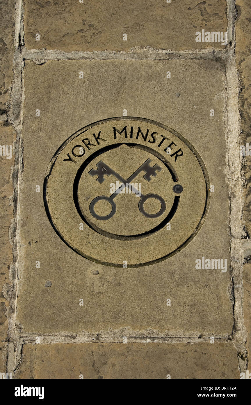 Close up of York Minster floor plaque sign on City Walls York North ...