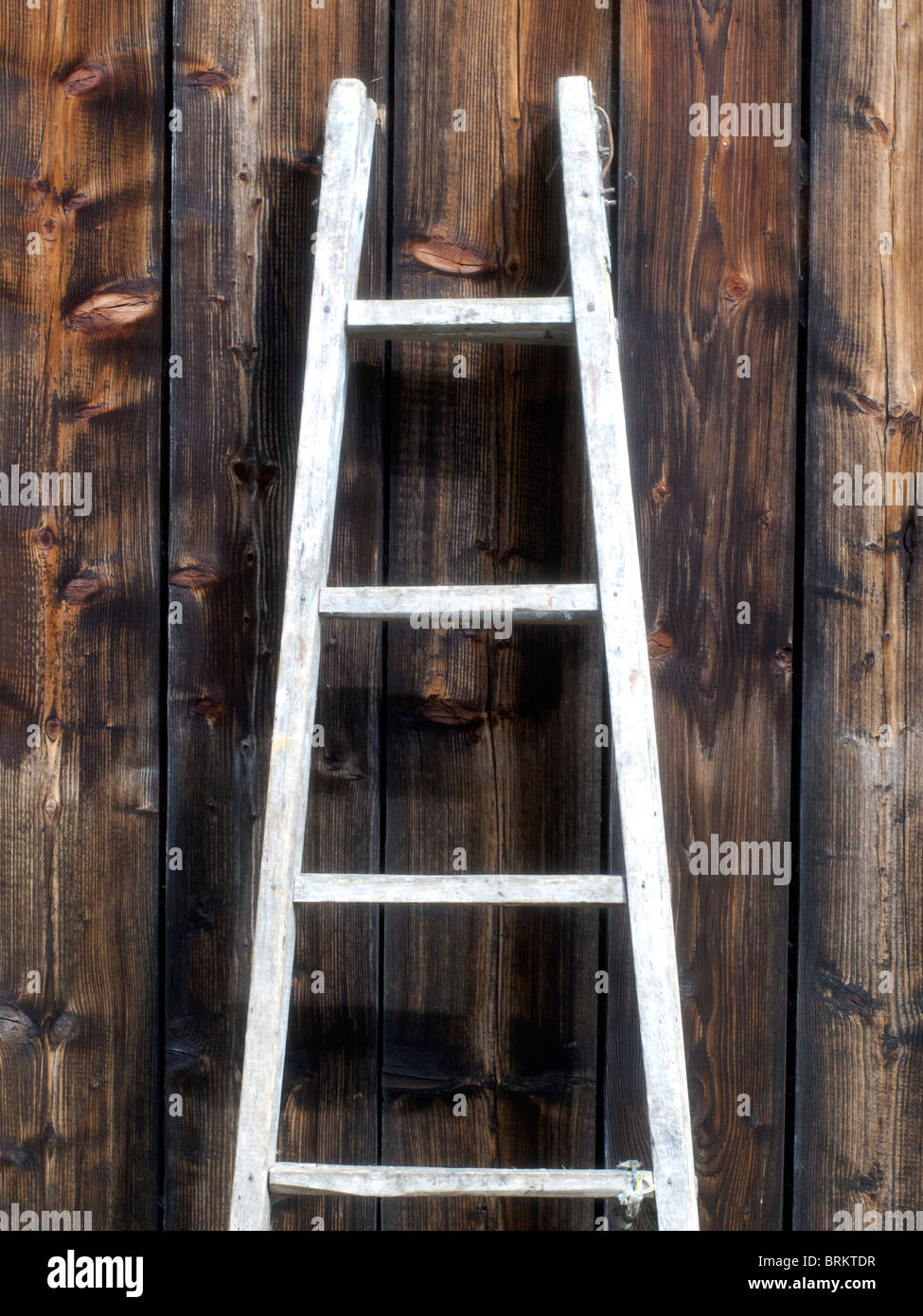 Ladder on the wall Stock Photo - Alamy
