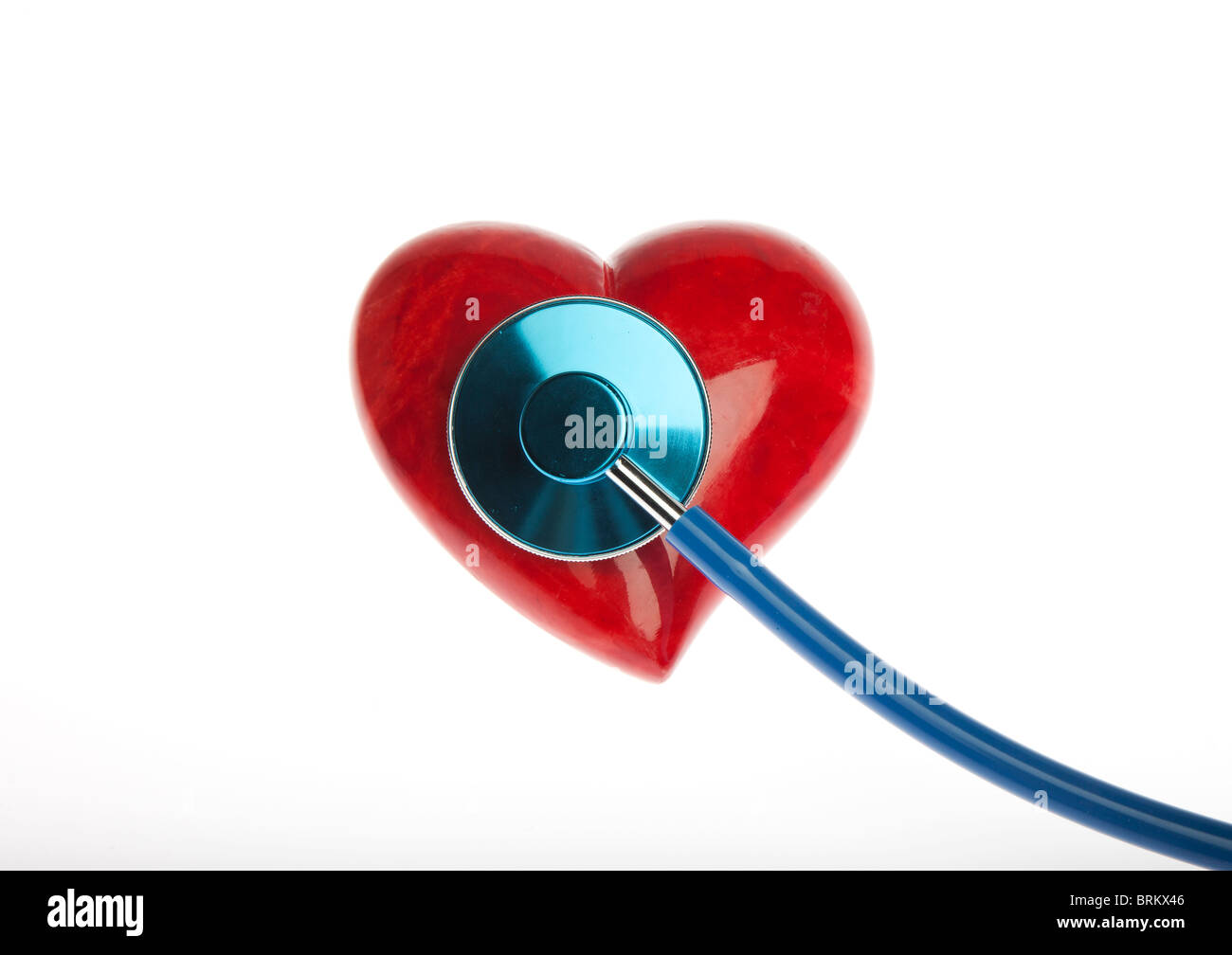Stethoscope on a heart Stock Photo - Alamy
