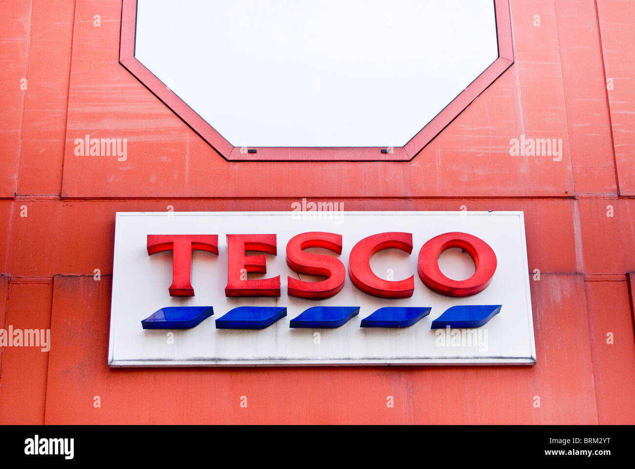 Tesco sign logo in a supermarket entrance Stock Photo - Alamy