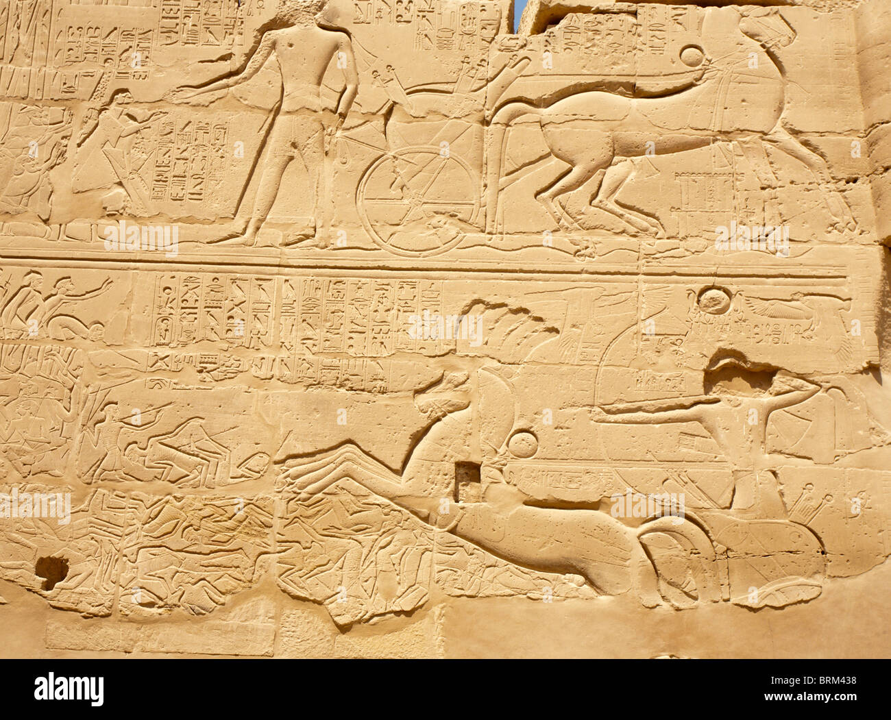 ancient Egyptian bas-reliefs on the wall of Karnak Temple, Egypt, Luxor ...