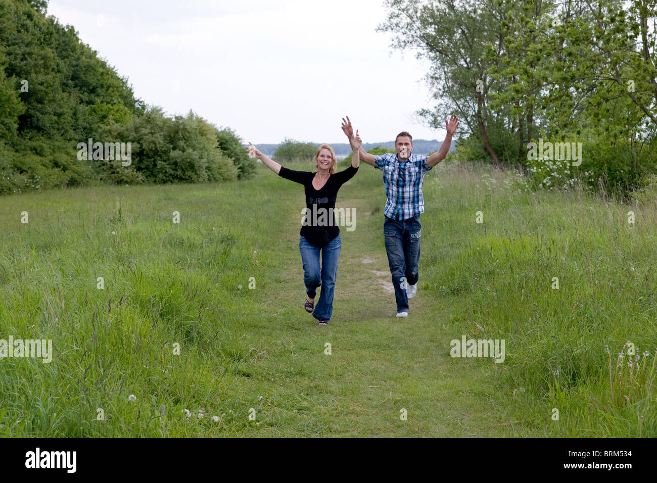 Running towards camera hi-res stock photography and images - Alamy