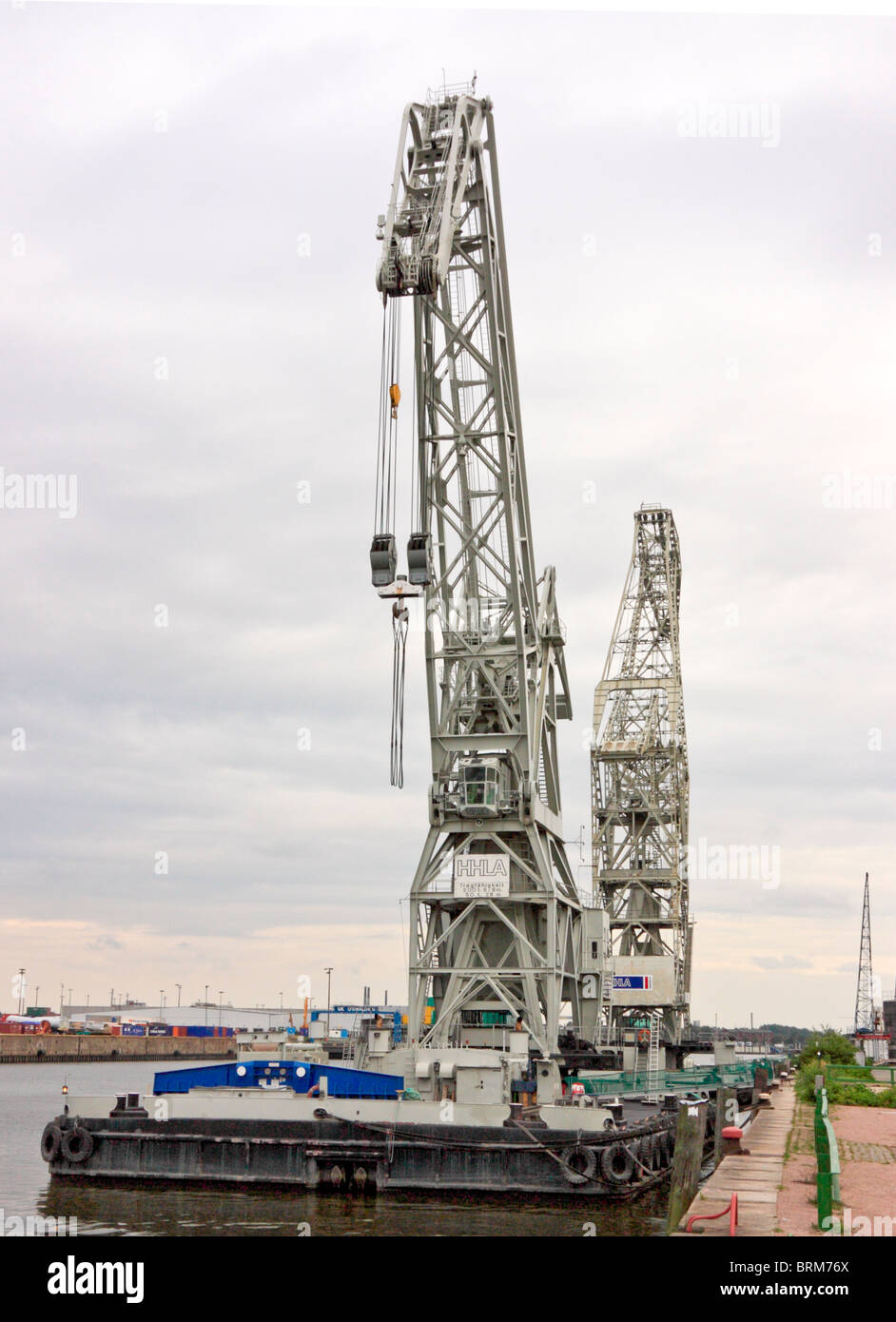 Floating heavy lift crane at the pier Stock Photo - Alamy
