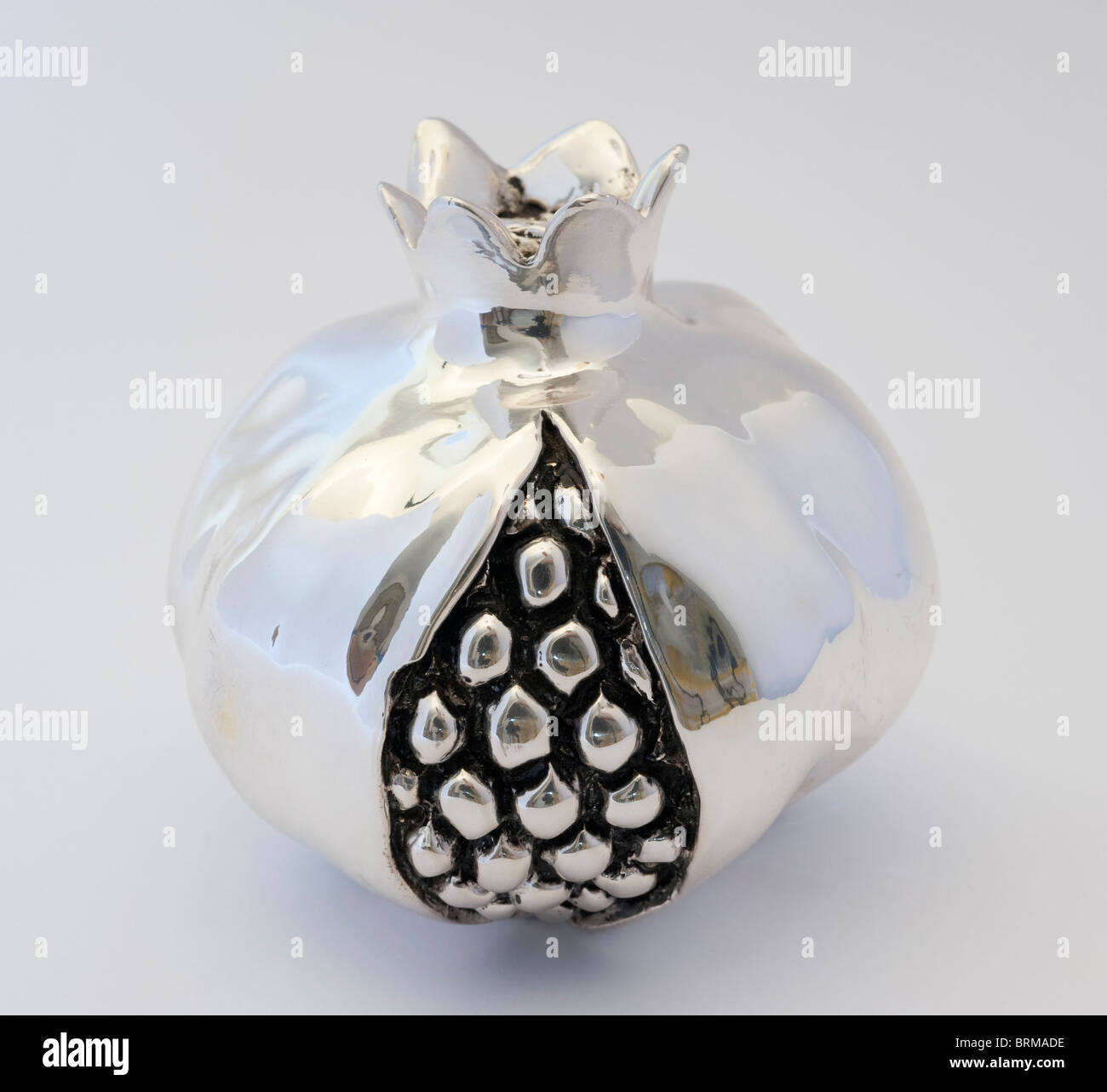 Silver pomegranate ornament Stock Photo - Alamy