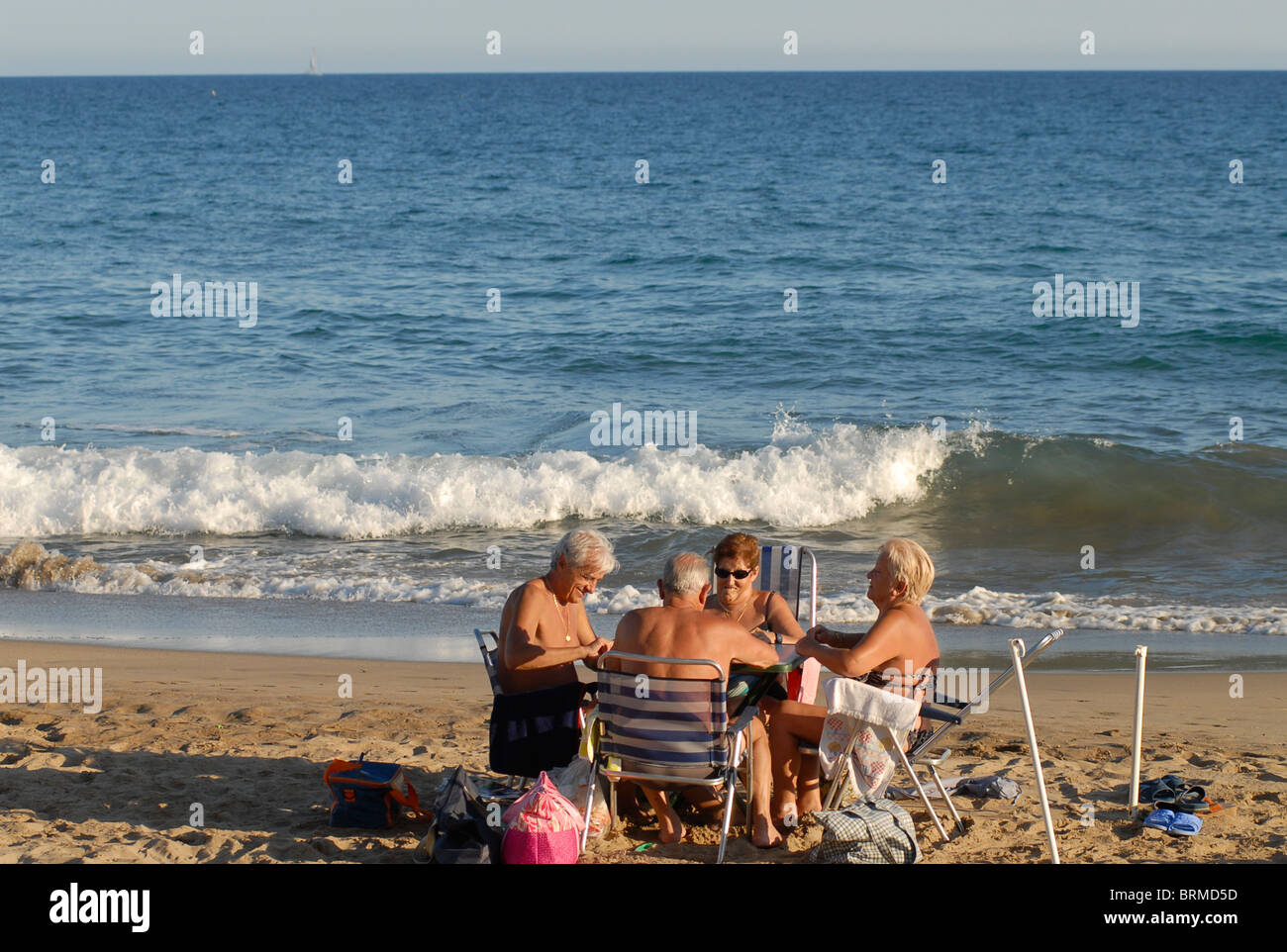 Spain Catalonia Costa Brava , tourist at beach in sea bath Garraf Stock ...