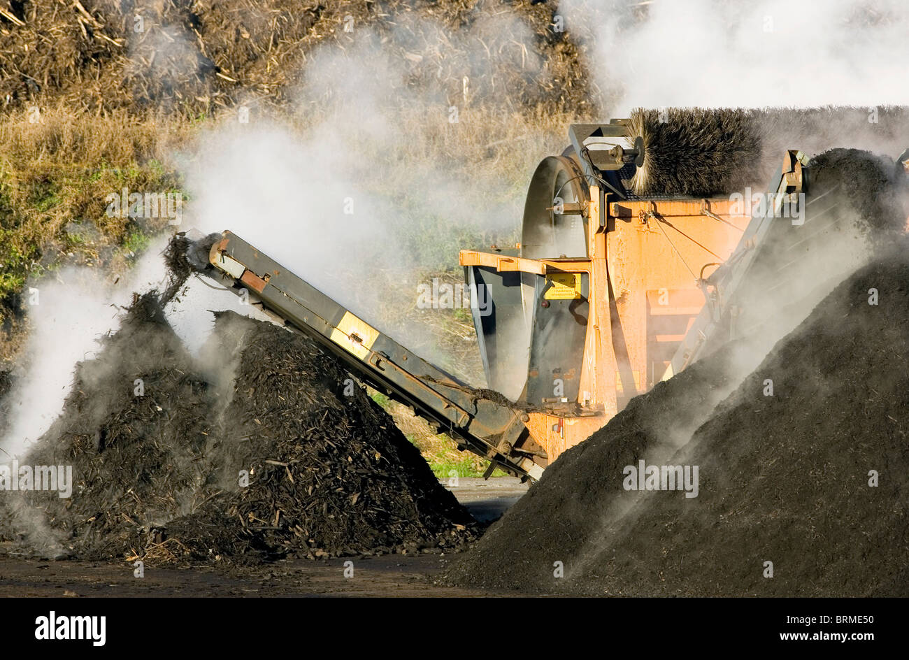 Garden waste being crushed and treated Stock Photo - Alamy