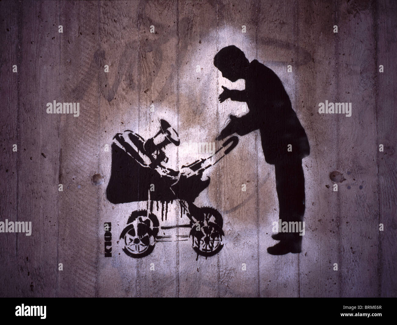 Invisible baby in a pram pointing a megaphone at its father, Graffito ...