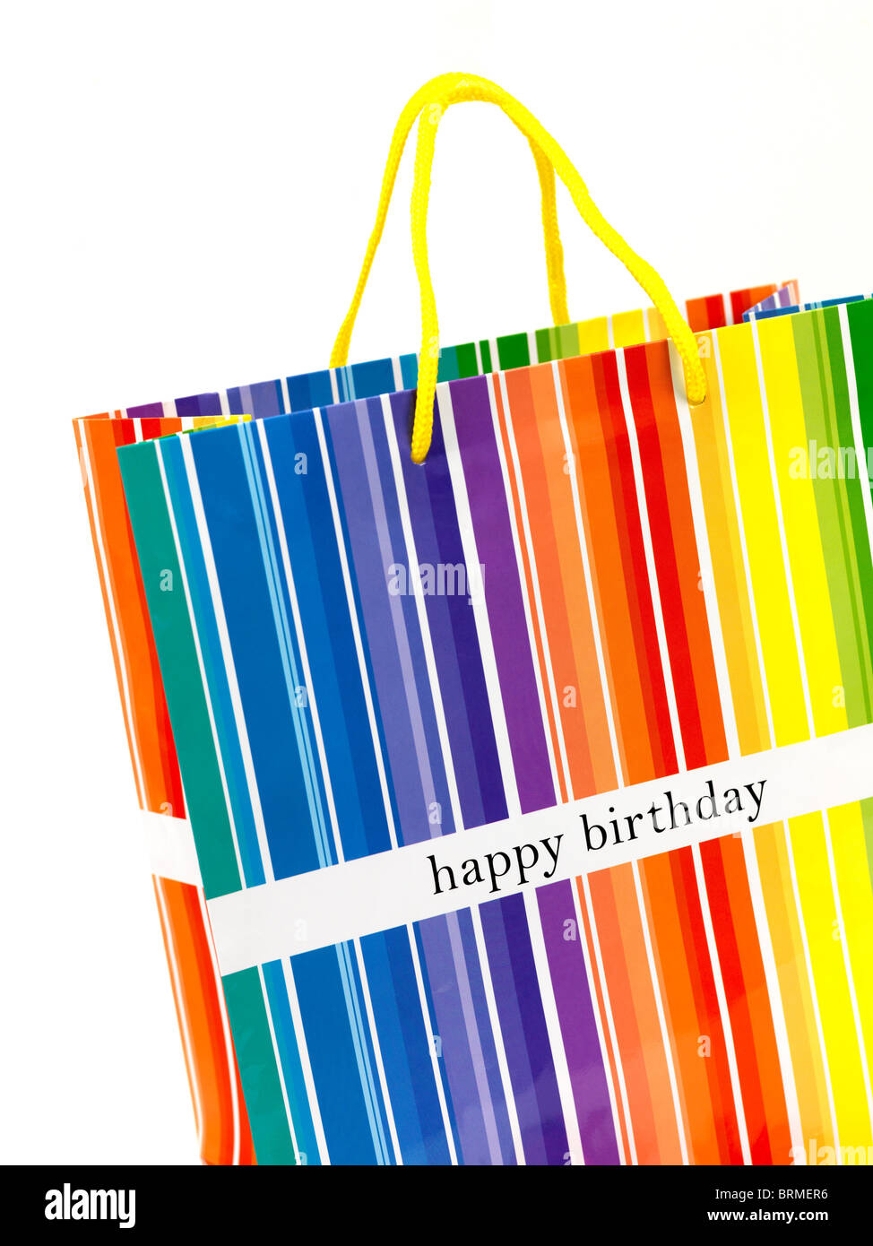 A happy birthday gift bag isolated against a white background Stock ...