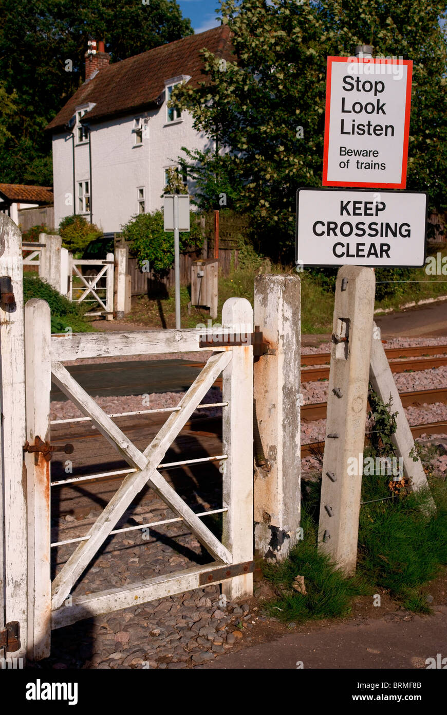 Railway pedestrian level crossing Stock Photo - Alamy