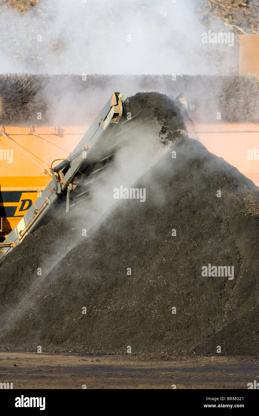 Garden waste being crushed and treated Stock Photo - Alamy