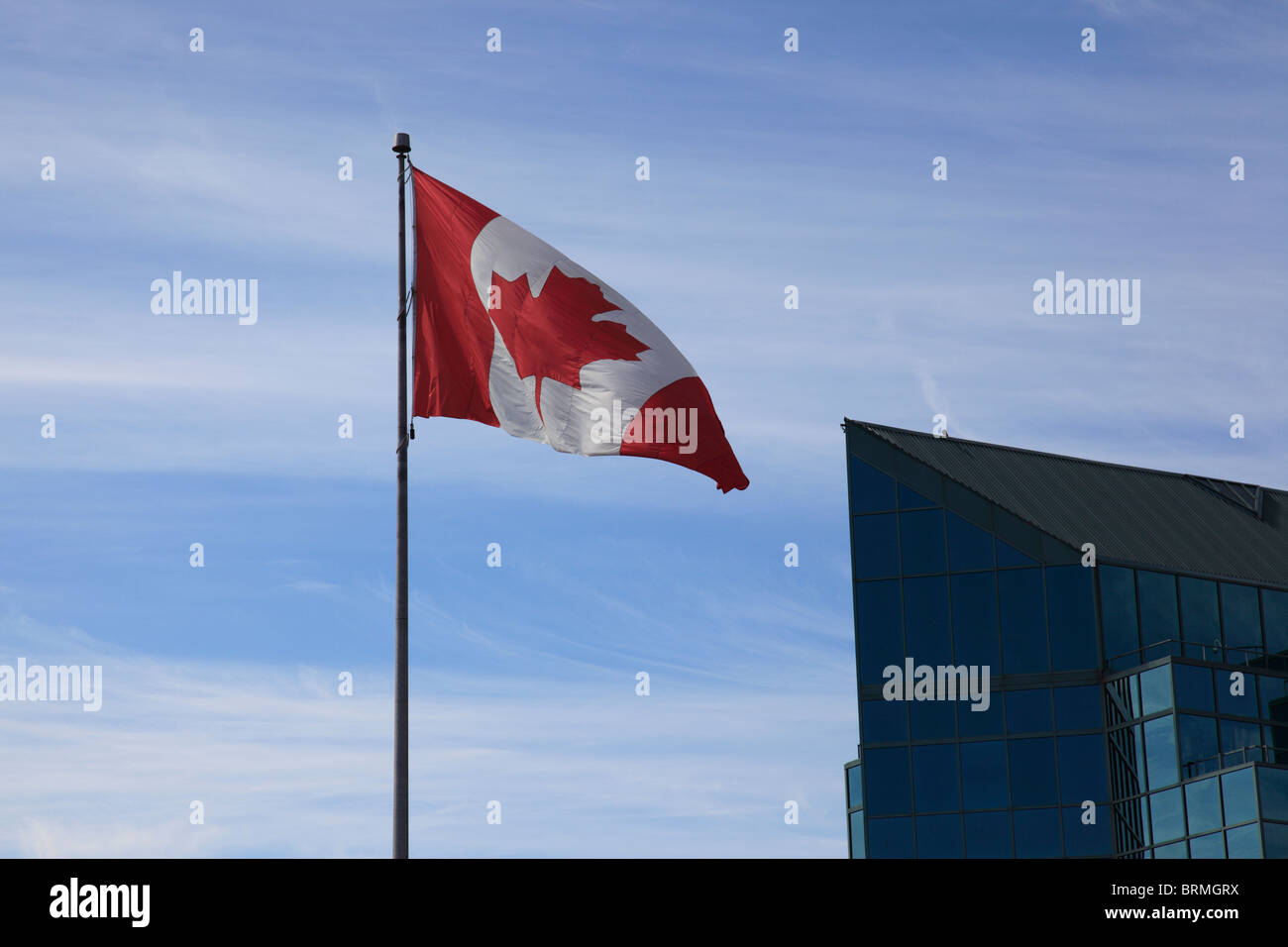 flying Canadian flag at Harbourwalk building, Halifax, Nova Scotia ...