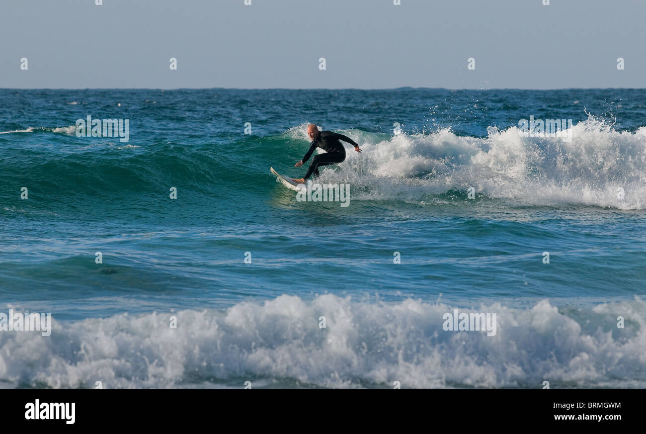 A surfer riding a wave. Photo by Gordon Scammell Stock Photo - Alamy