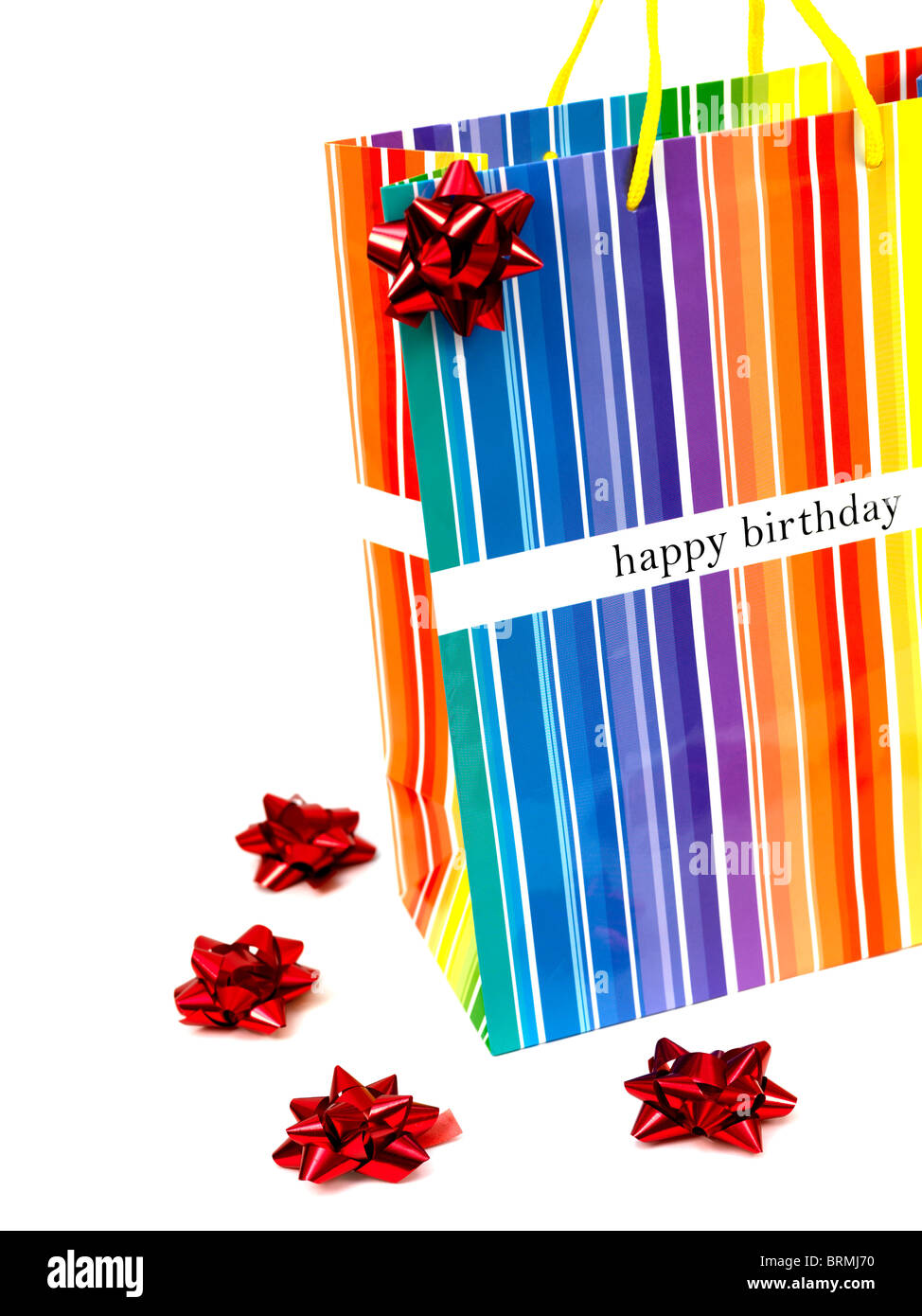 A happy birthday gift bag isolated against a white background Stock ...