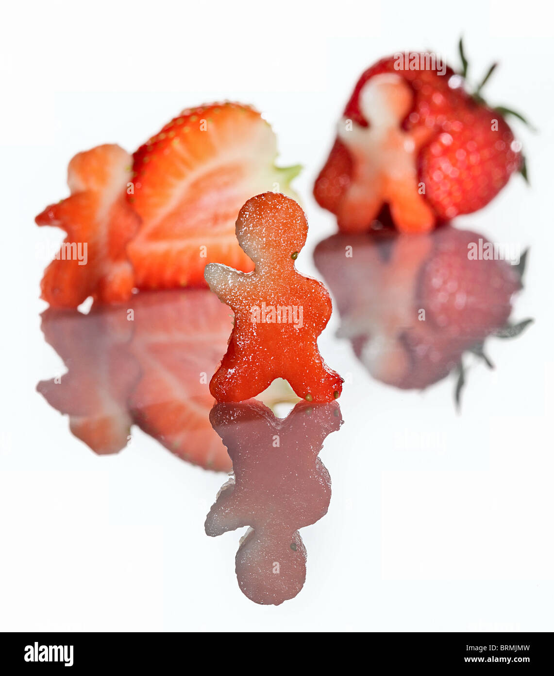 strawberry alien people carving Stock Photo - Alamy