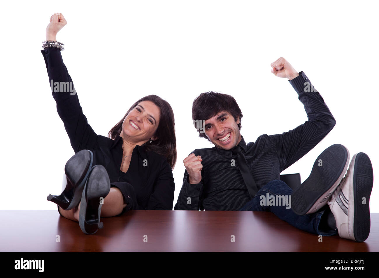 Happy and successful business team relaxing at the office Stock Photo ...