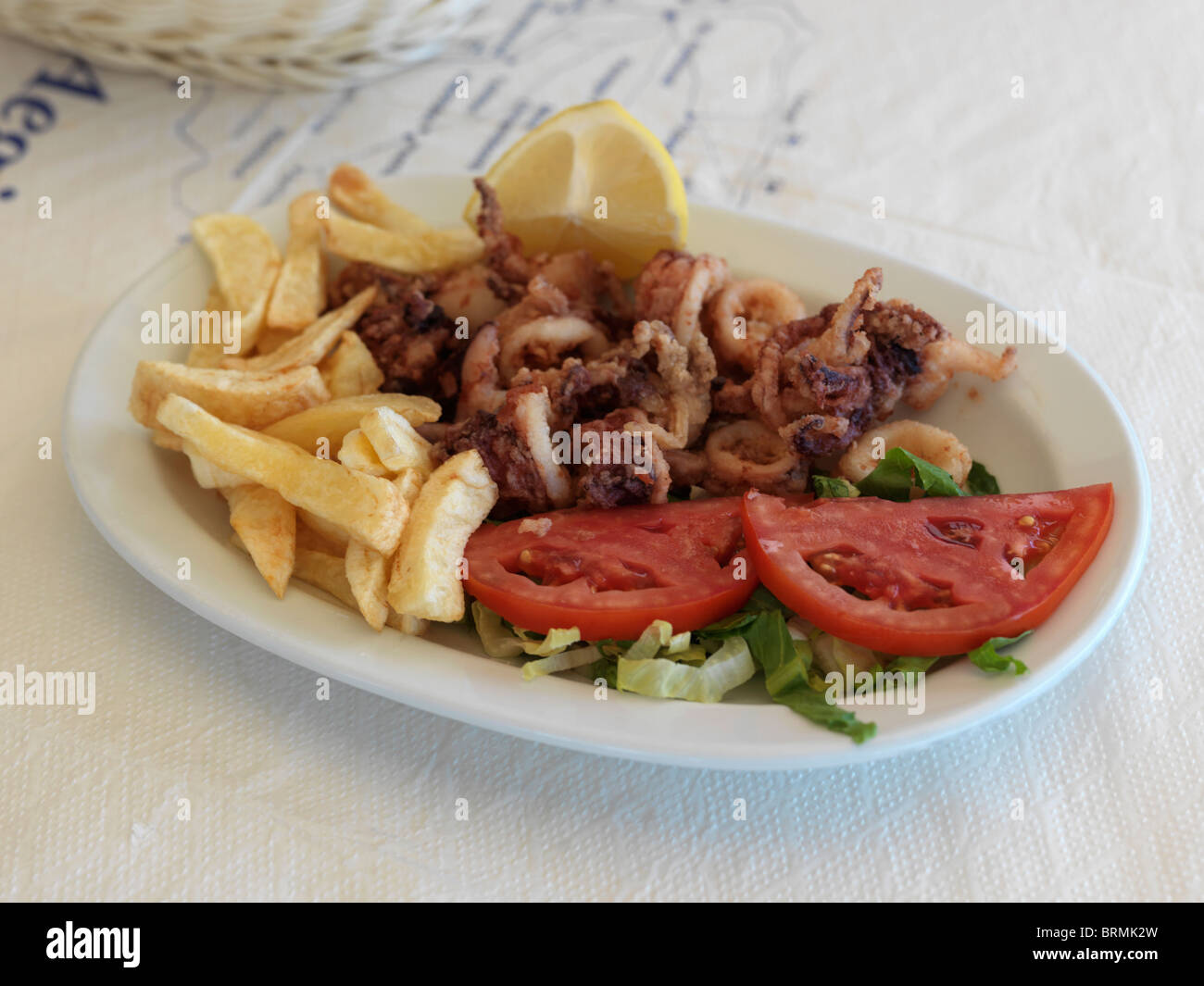 Aegina Greece Argo-Saronic Islands Calamari With Chips And Salad With ...