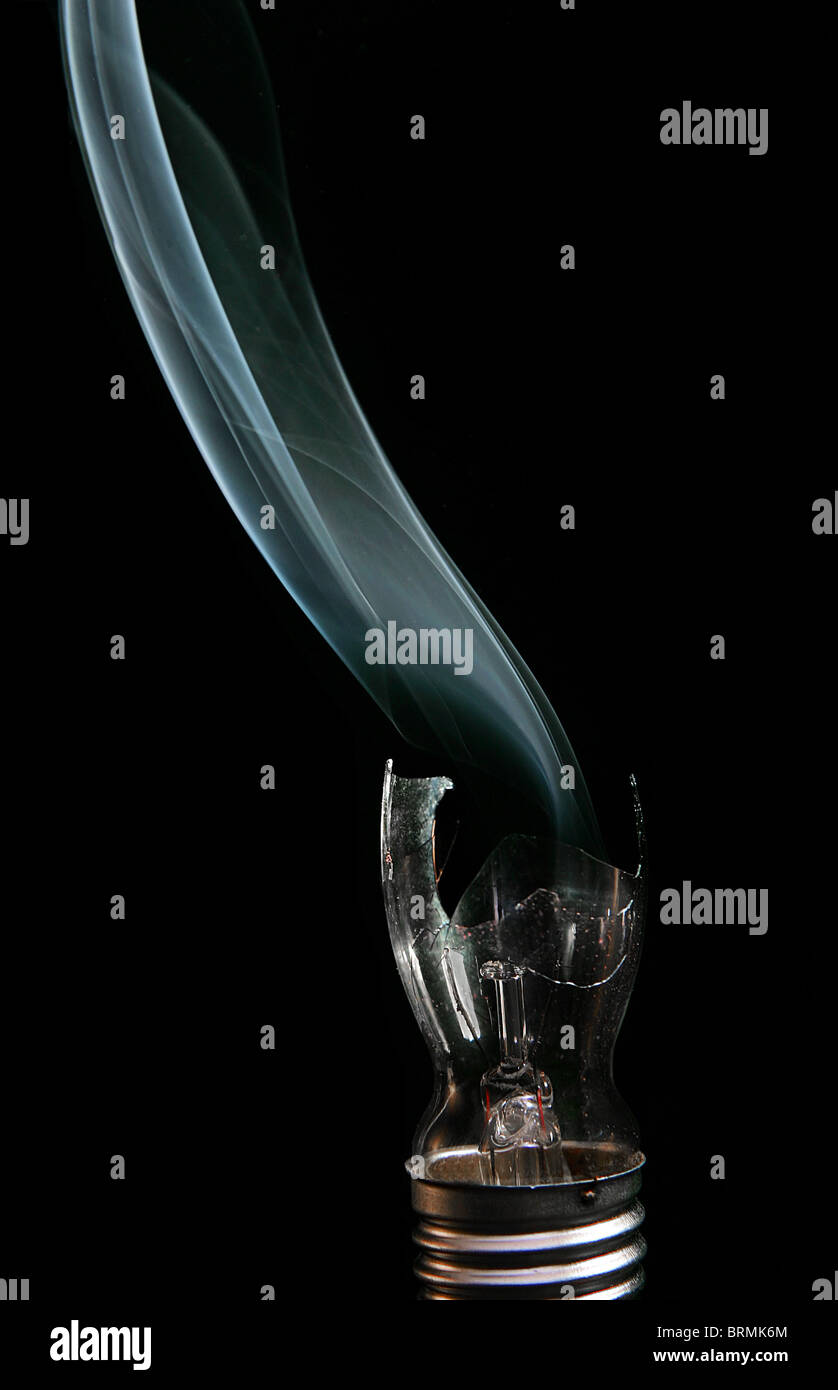 smashed lightbulb fixture oozing smoke streams Stock Photo - Alamy