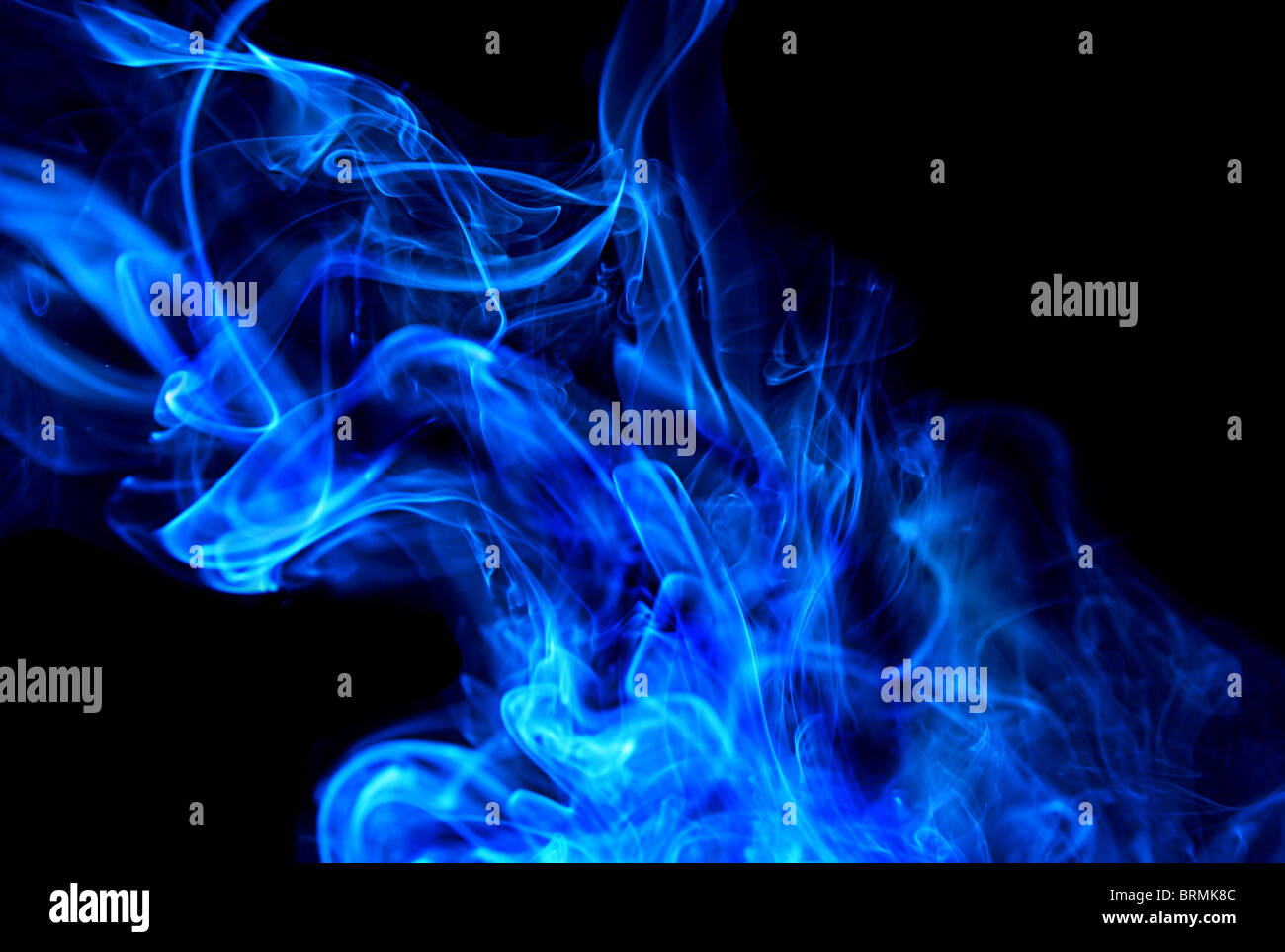 large abstract cloud of blue smoke streaming up Stock Photo - Alamy