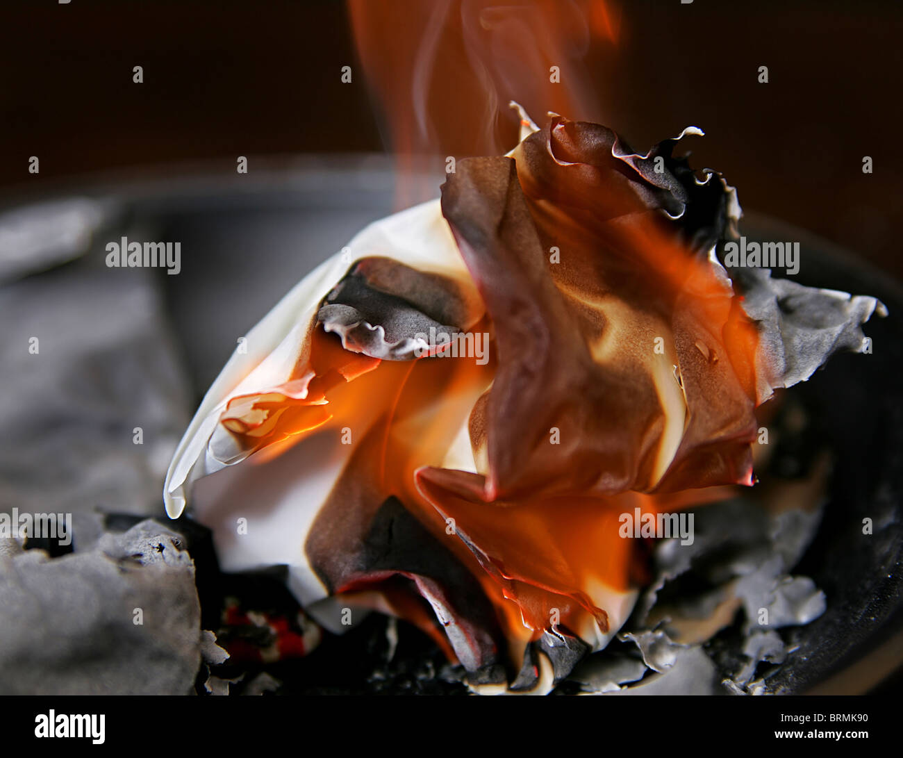 Burning paper hi-res stock photography and images - Alamy