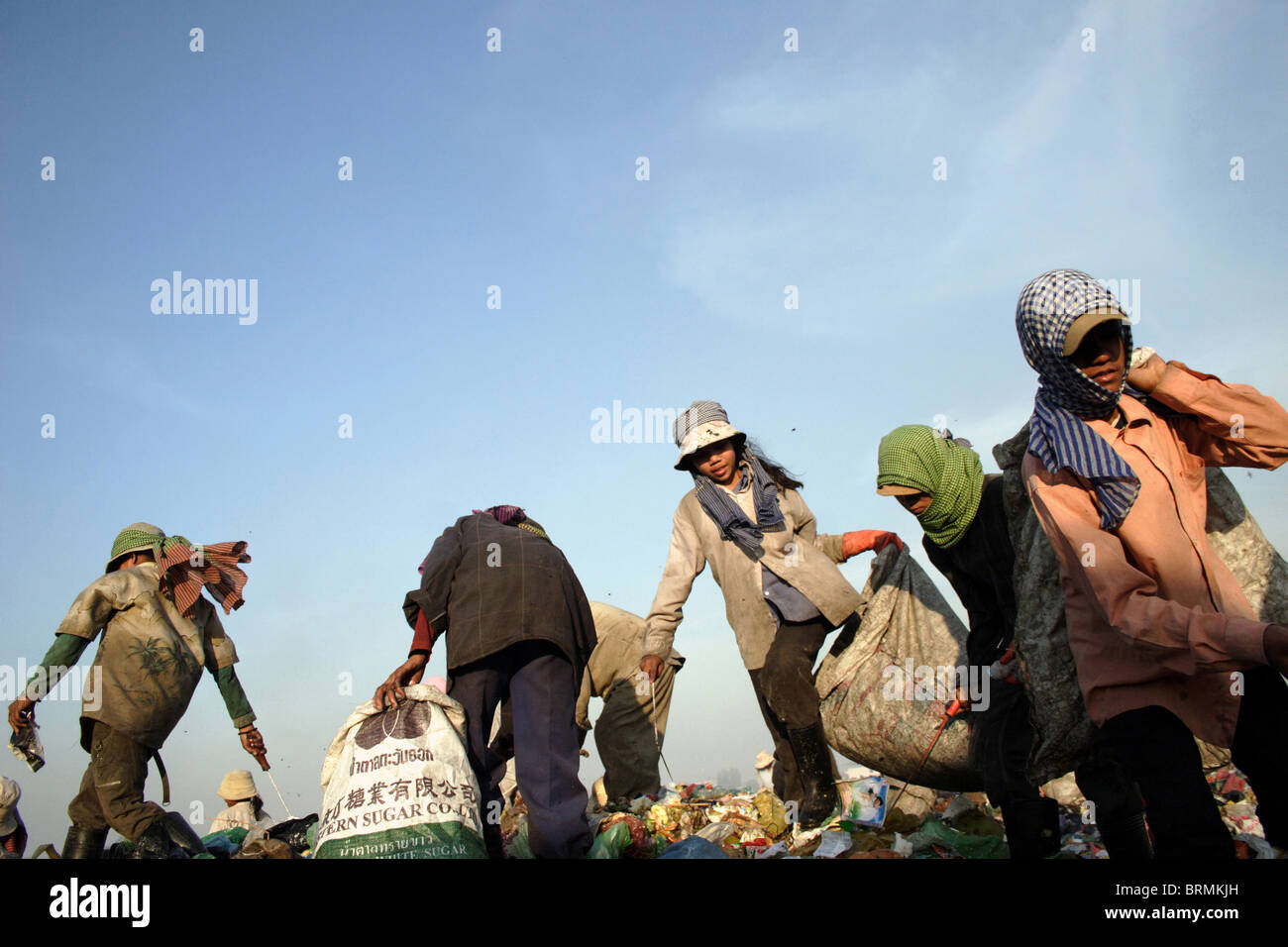 Female Garbage Collector Stock Photos & Female Garbage Collector Stock ...