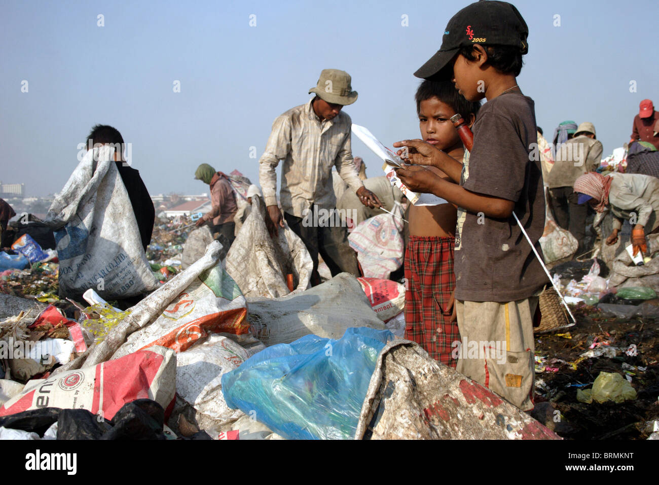 Child work garbage hi-res stock photography and images - Alamy