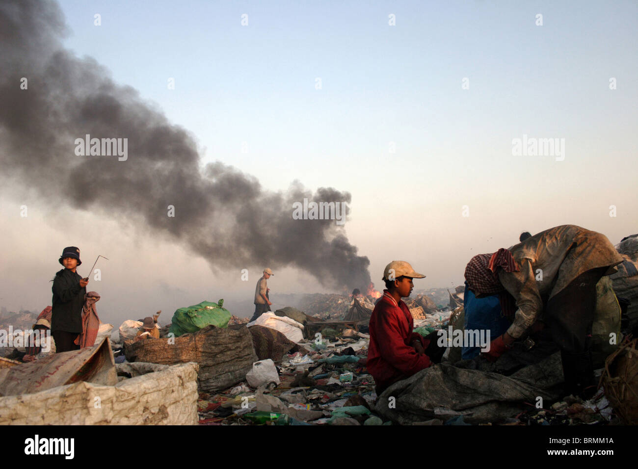 The sky begins to fill with smoke from burning garbage at The Stung ...