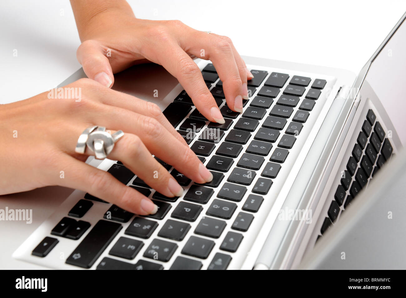 desk with laptop and hand Stock Photo - Alamy