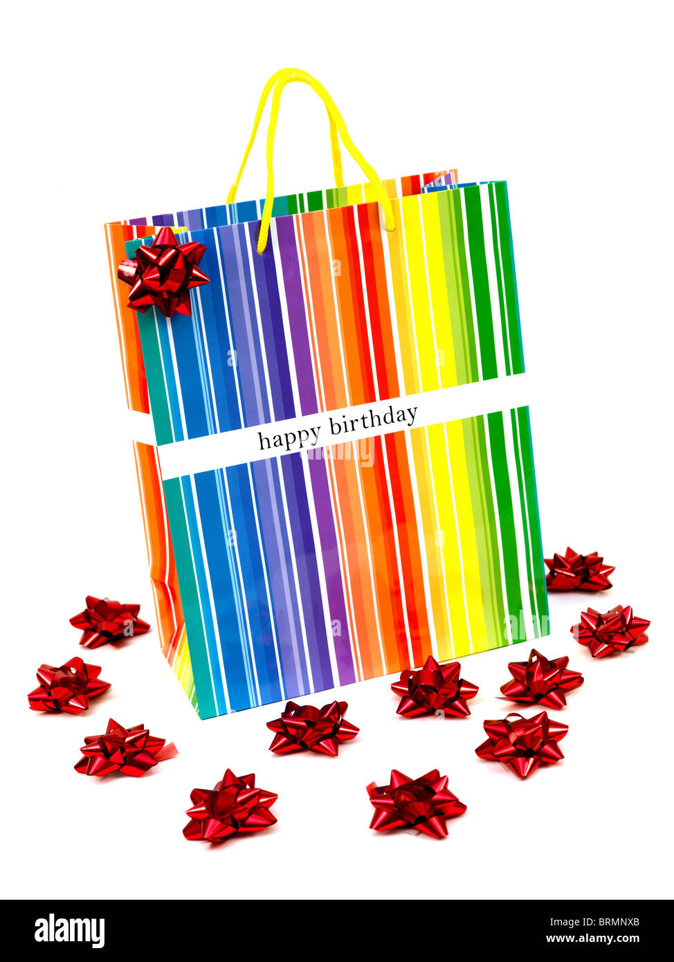 A happy birthday gift bag isolated against a white background Stock ...