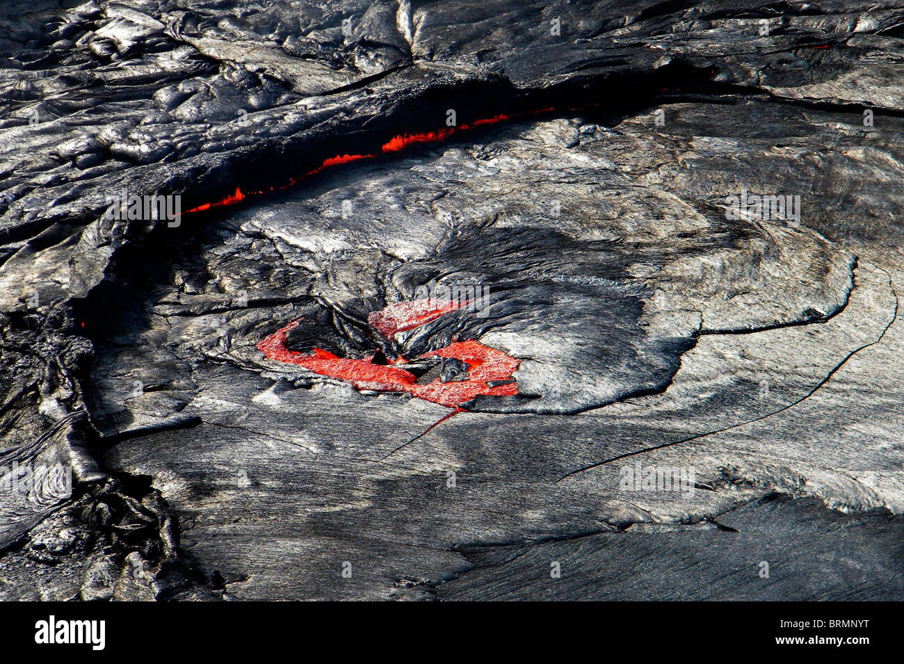 A pool of molten lava in the crater of an active volcano Stock Photo ...