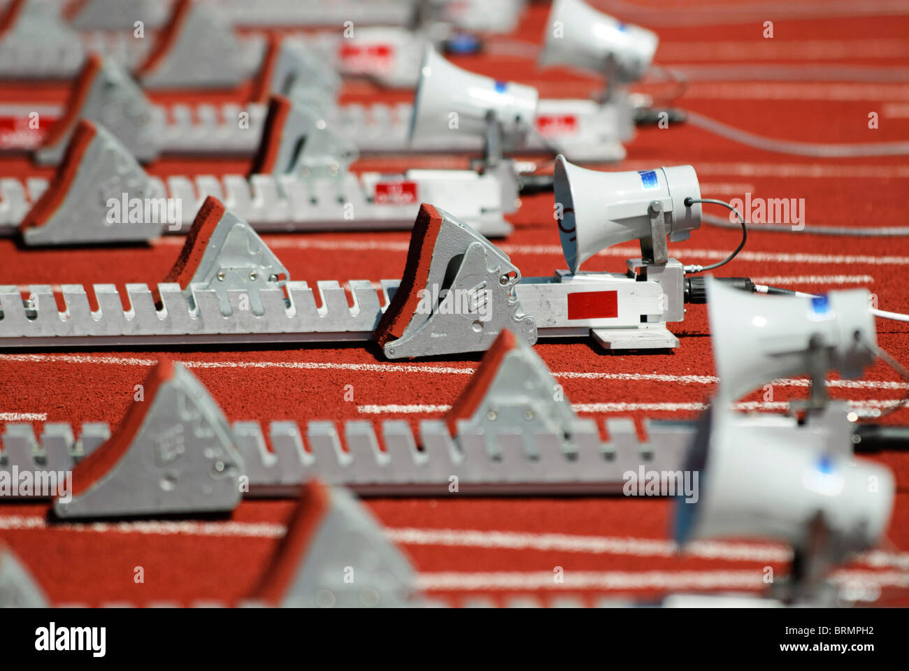 starting blocks on sports running track Stock Photo - Alamy