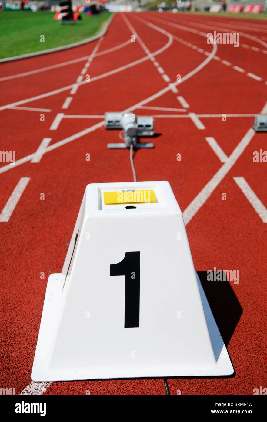 empty starting blocks on running track Stock Photo - Alamy