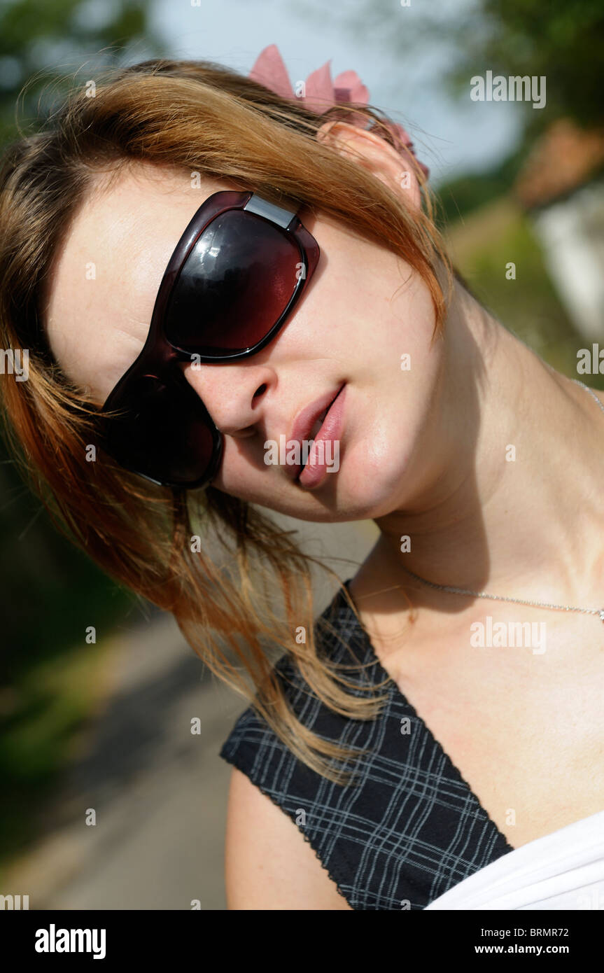Stock photo of a teenage girl wearing sunglasses Stock Photo - Alamy