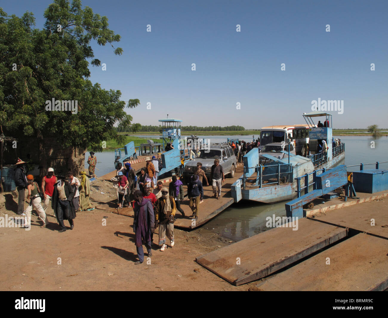 People disembarking from a ferry Stock Photo - Alamy