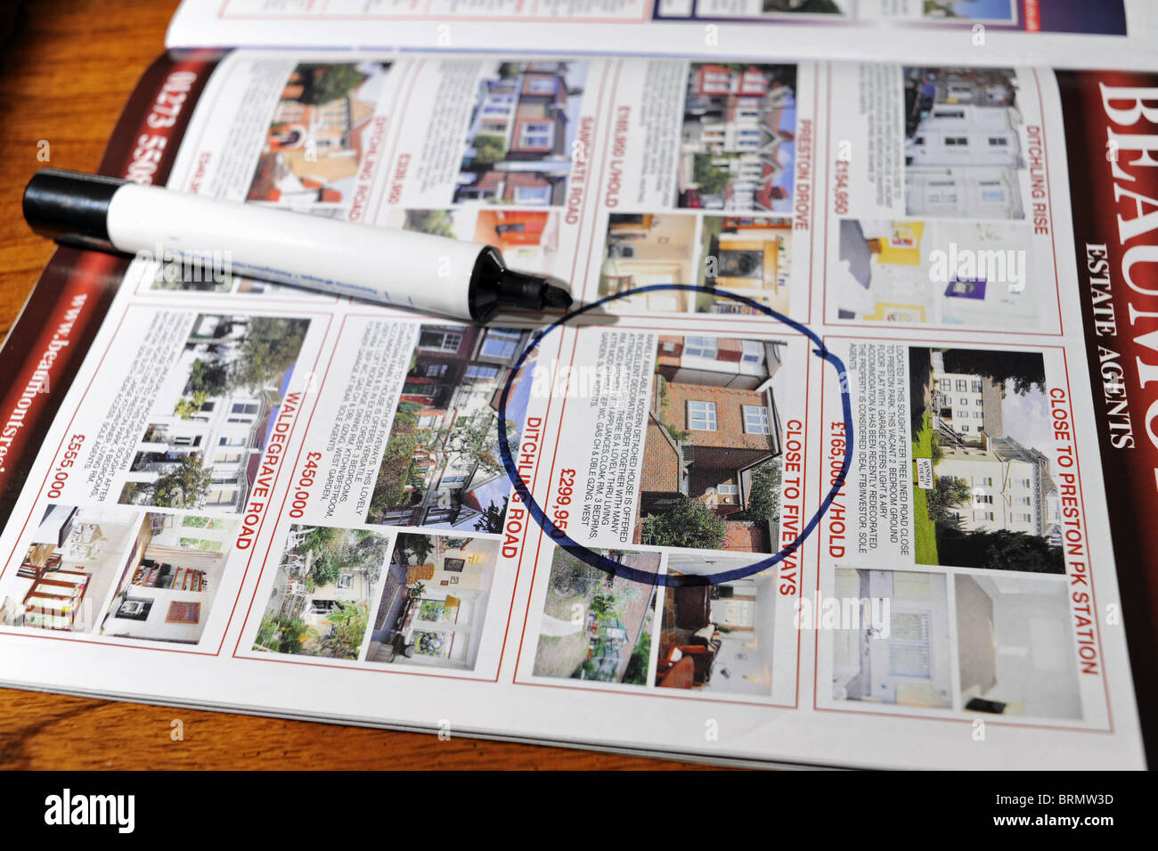 Property section newspaper hi-res stock photography and images - Alamy