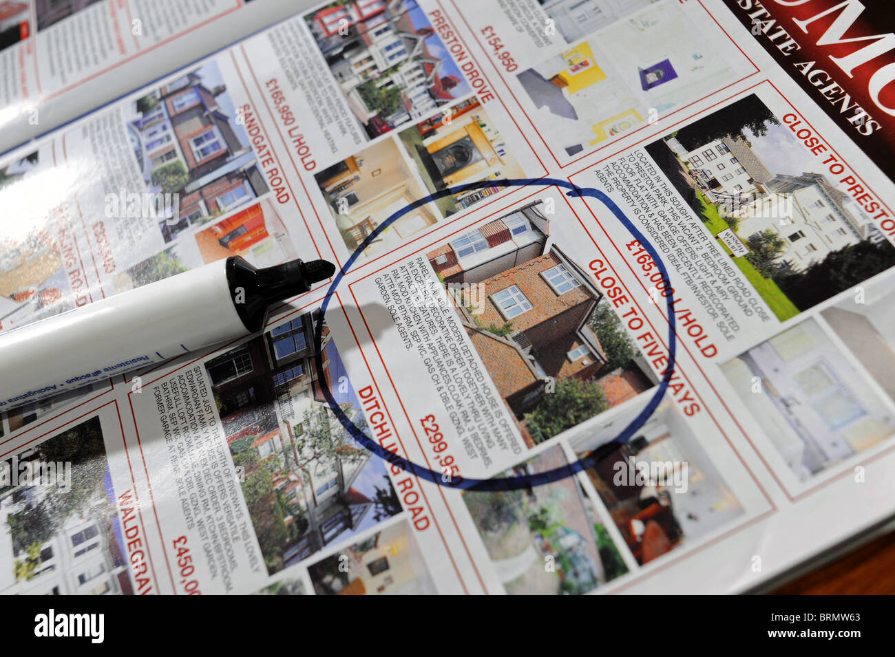Property section newspaper hi-res stock photography and images - Alamy