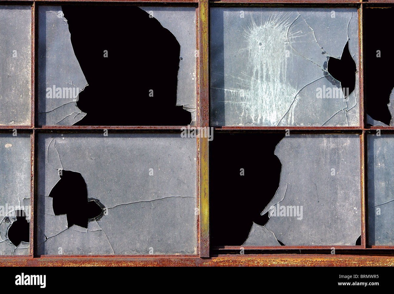 smashed and broken windows on an old farm Stock Photo - Alamy