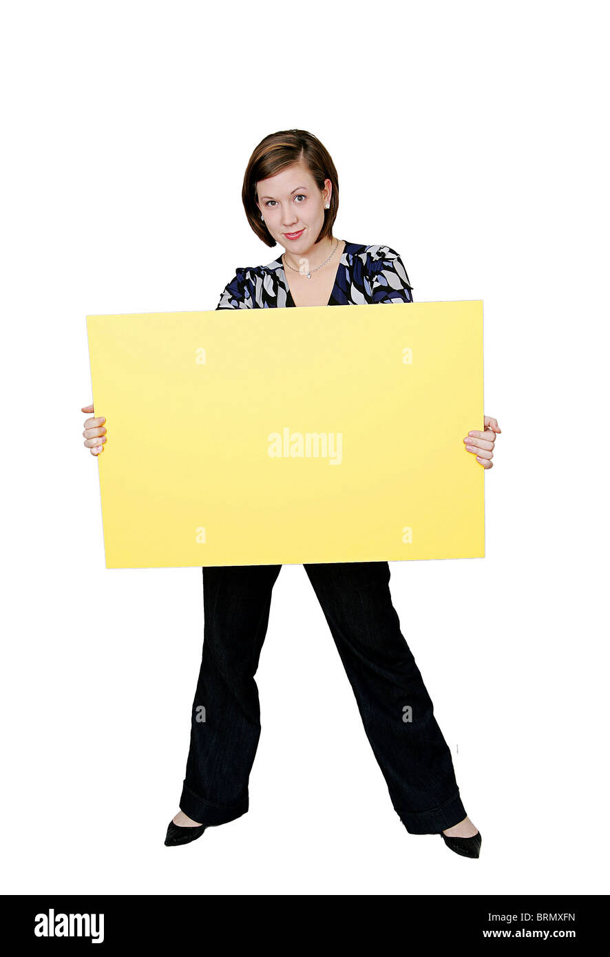 an attractive young female holding a large blank message sign Stock ...