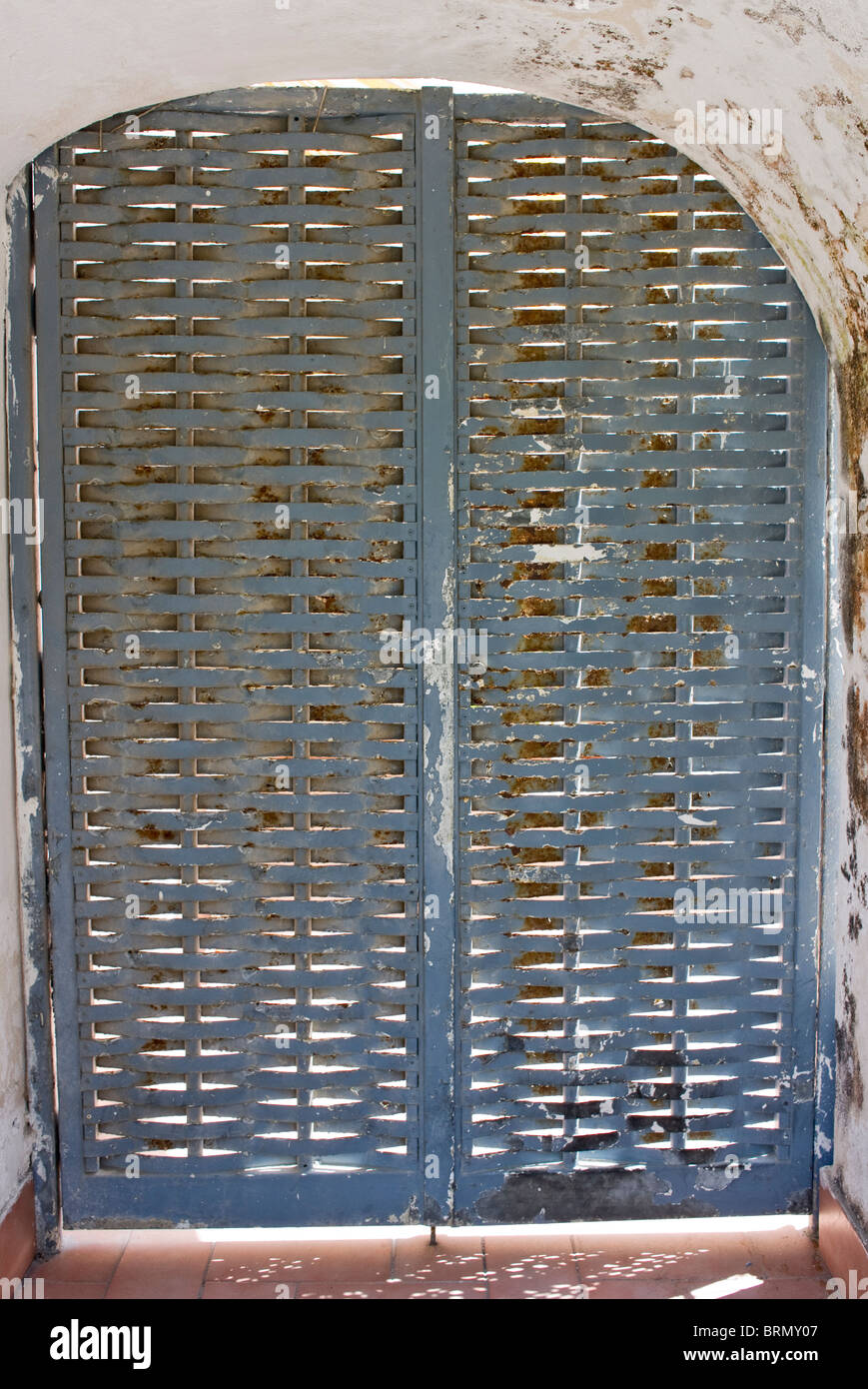 a blue iron gate Stock Photo - Alamy